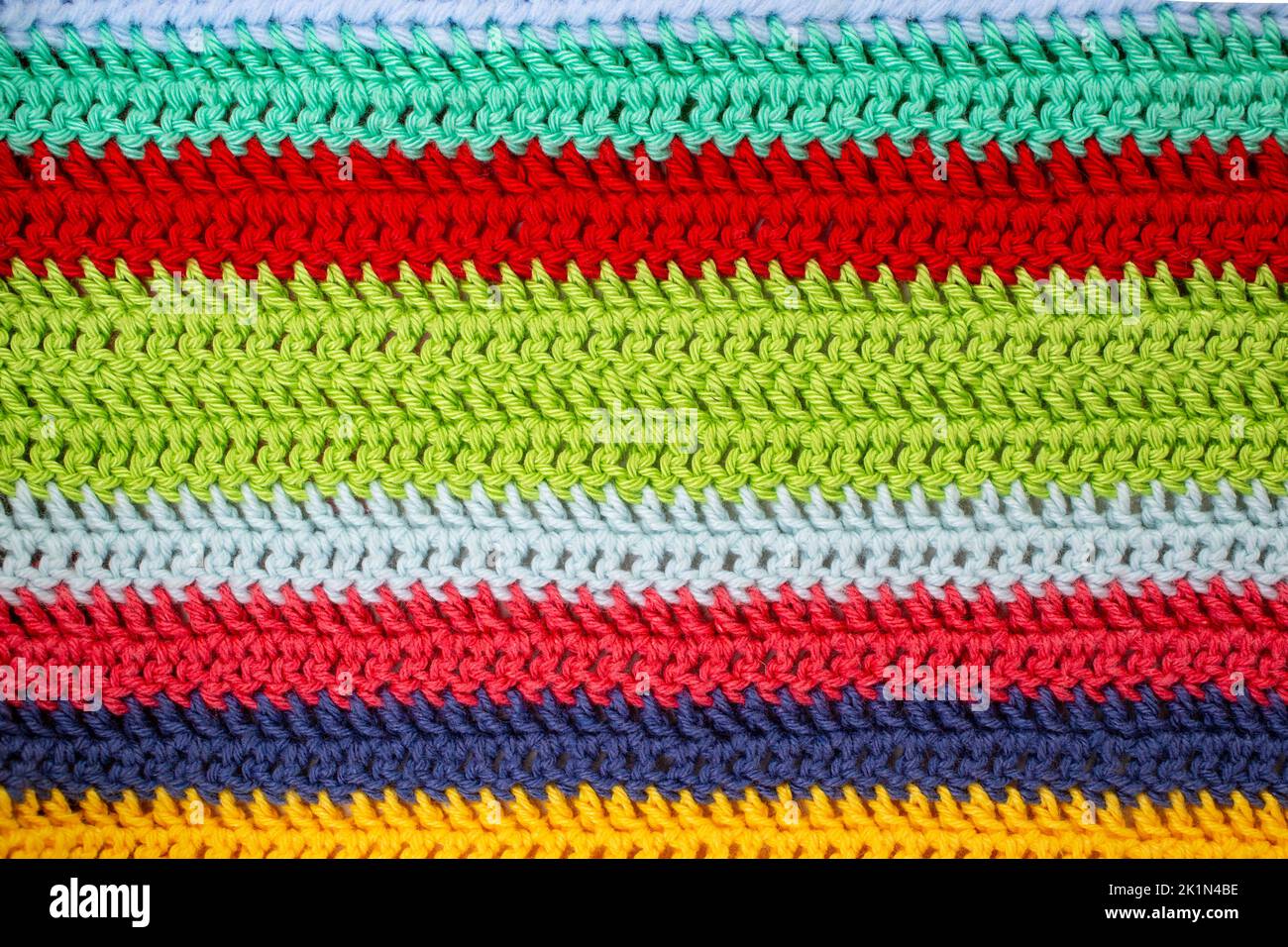 horizontal multi colored crochet lines pattern, abstract close up ...