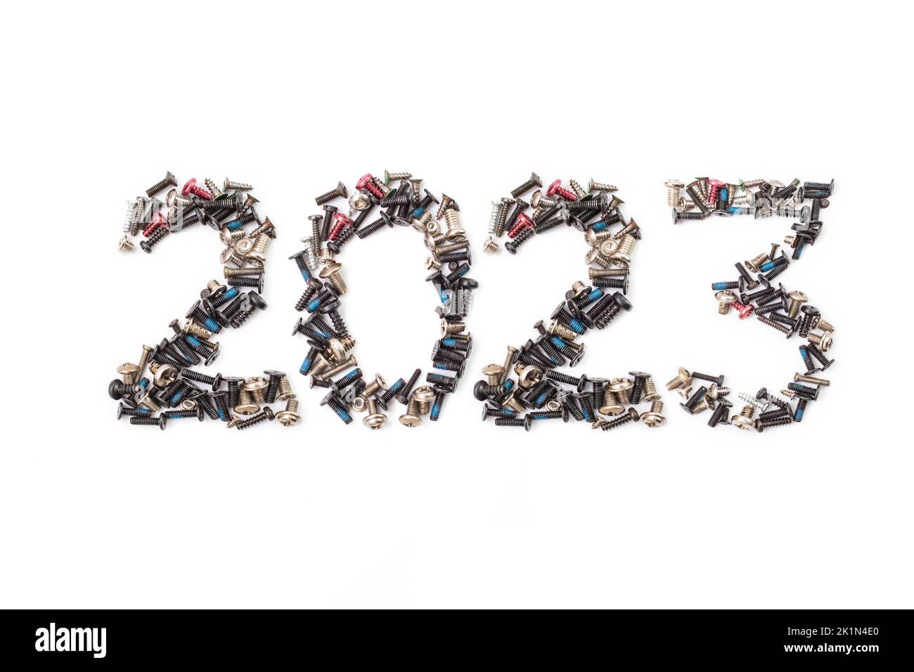 2023 written with tiny screws , close up isolated on white Stock Photo ...