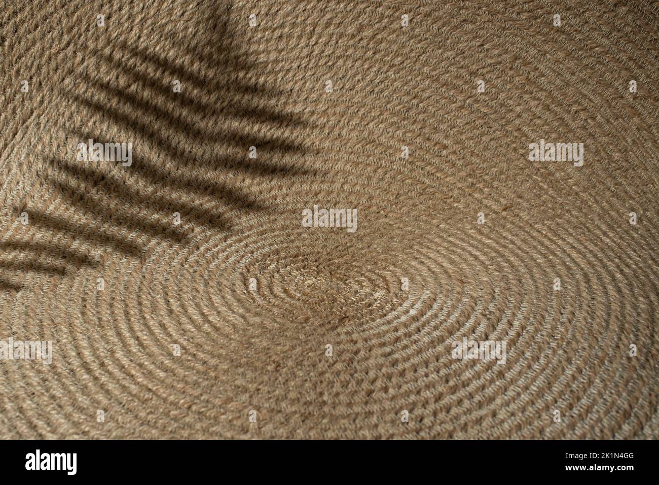 Bent jute rope rug, close up texture, with empty space. backdrop for ...