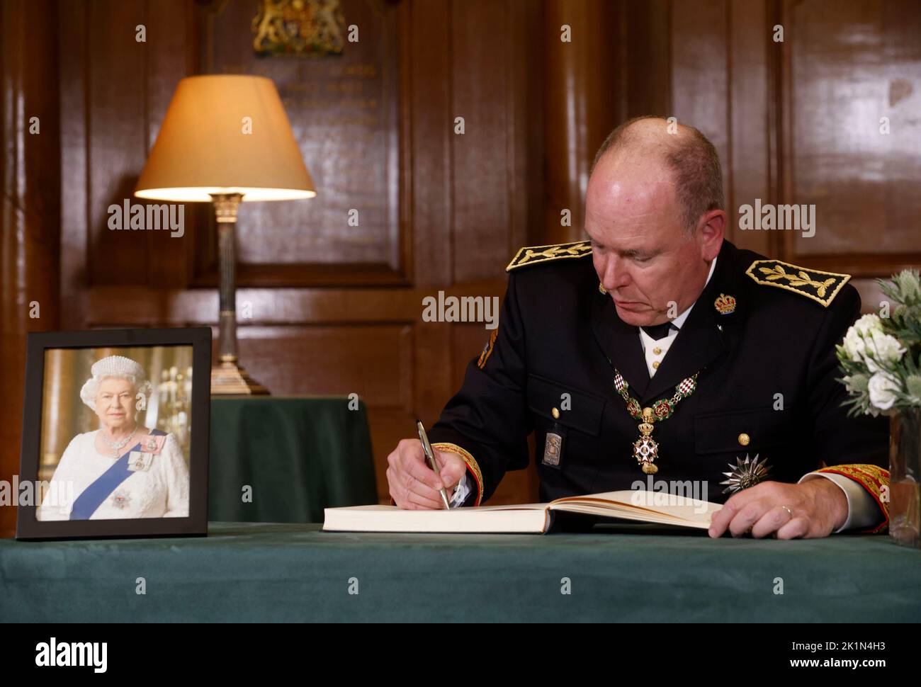 Prince Albert II of Monaco, signs a book of condolence at Church House ...