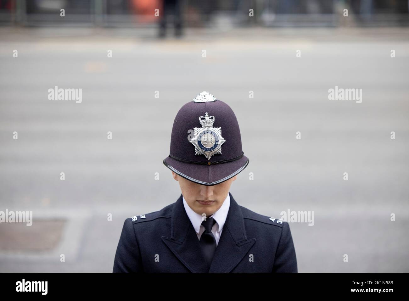 London, UK. 19th Sep, 2022. A Met Police Officer seen with his helmet ...