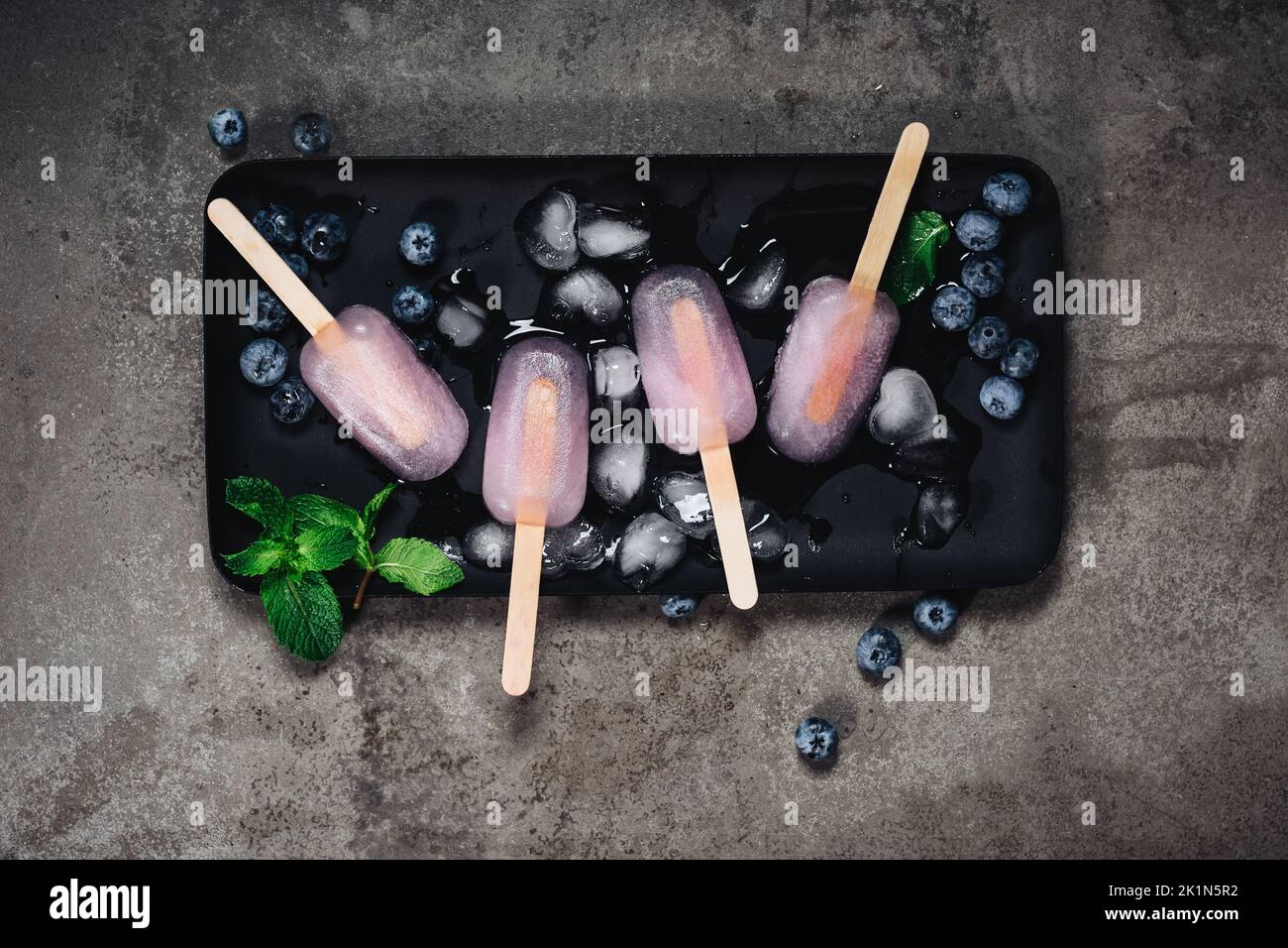Blueberry mojito popsicles. Refreshing frozen cocktail, top view Stock ...