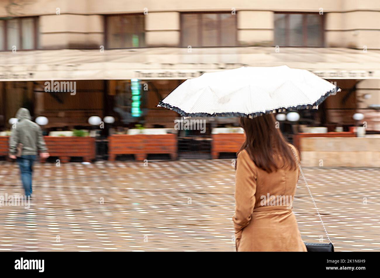 Timisoara, Romania - March 23, 2016: Woman walking on the street in the ...