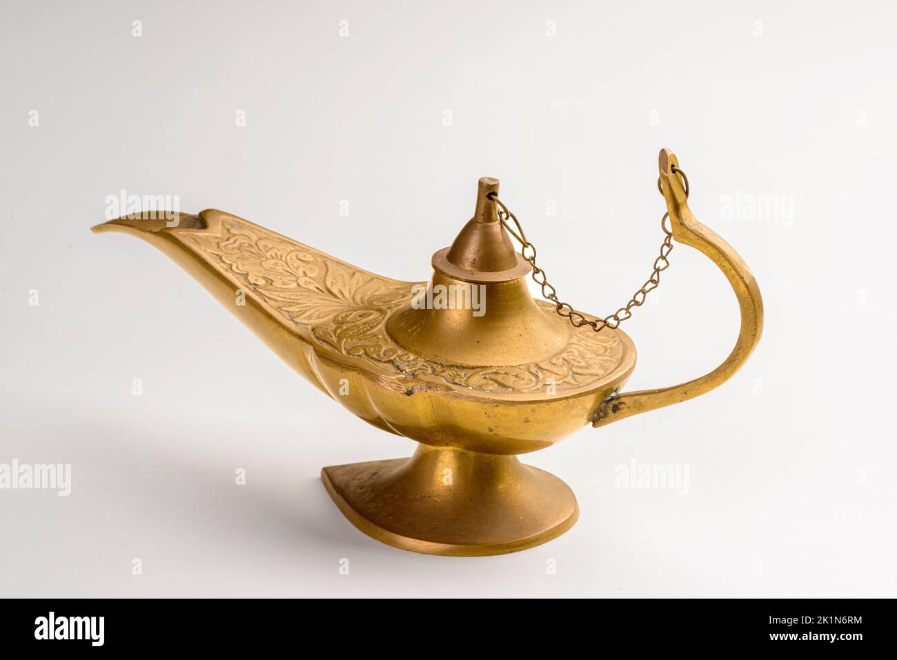 Aladdin's magic lamp isolated on white background Stock Photo - Alamy