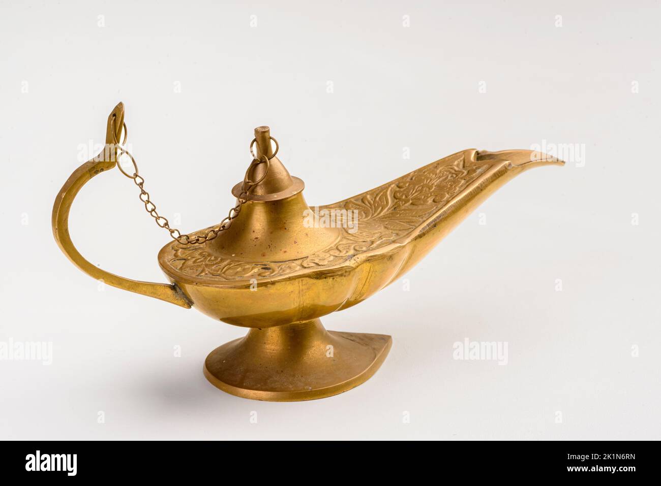 Aladdin's magic lamp isolated on white background Stock Photo - Alamy