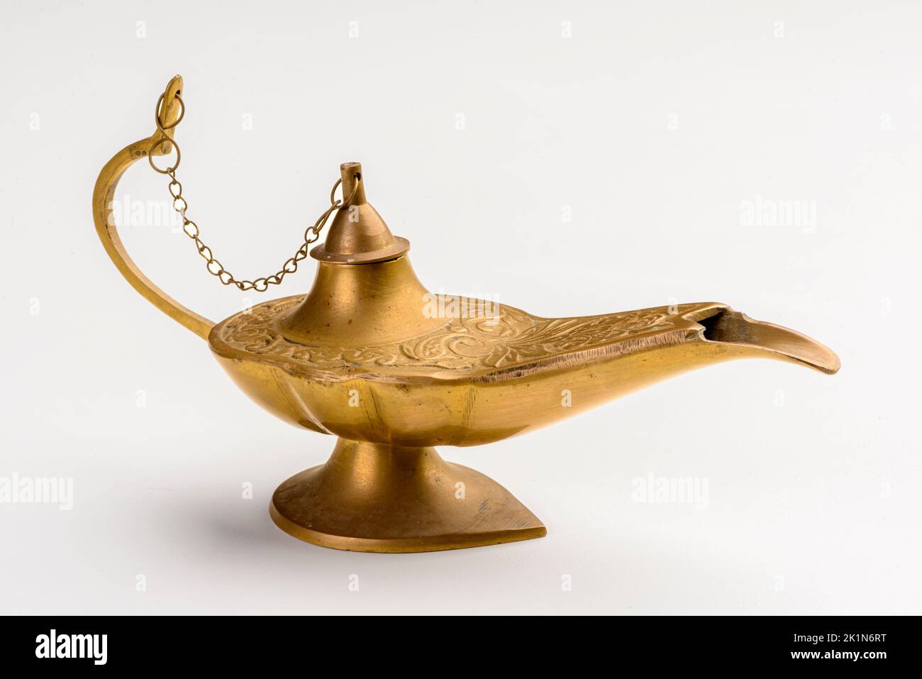 Aladdin's magic lamp isolated on white background Stock Photo - Alamy
