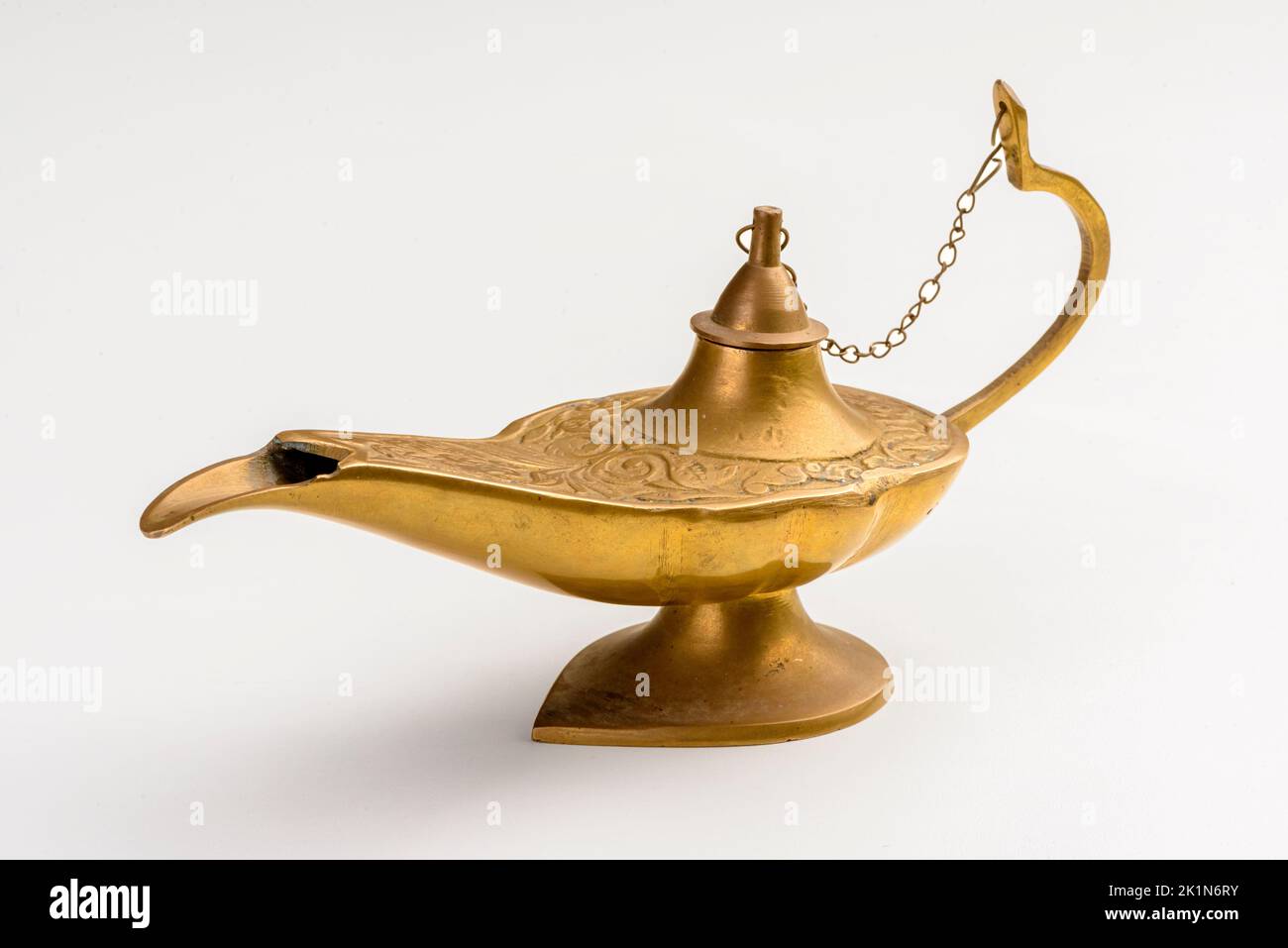 Aladdin's magic lamp isolated on white background Stock Photo - Alamy