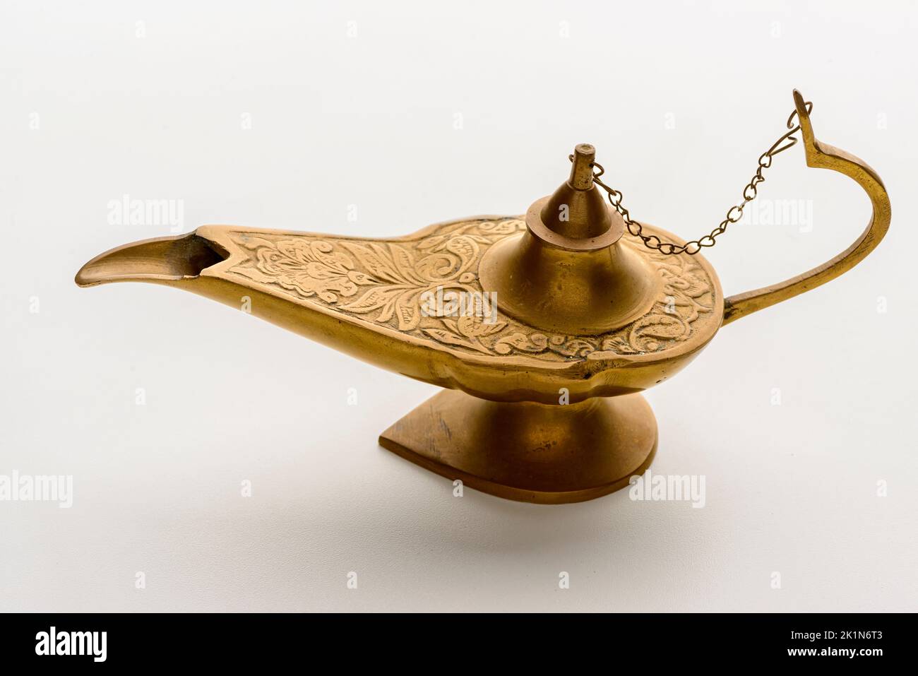 Aladdin's magic lamp isolated on white background Stock Photo - Alamy