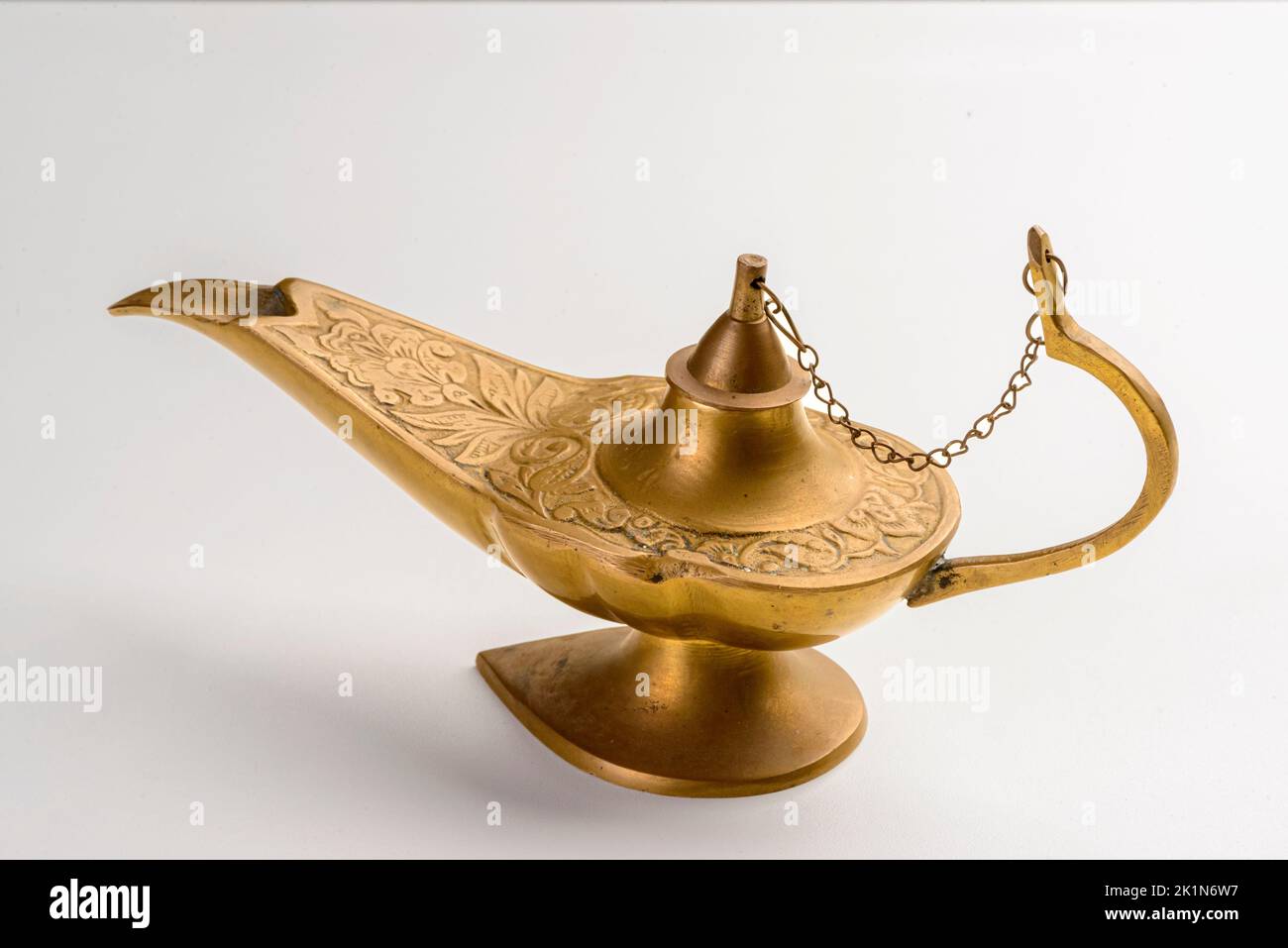 Aladdin's magic lamp isolated on white background Stock Photo - Alamy