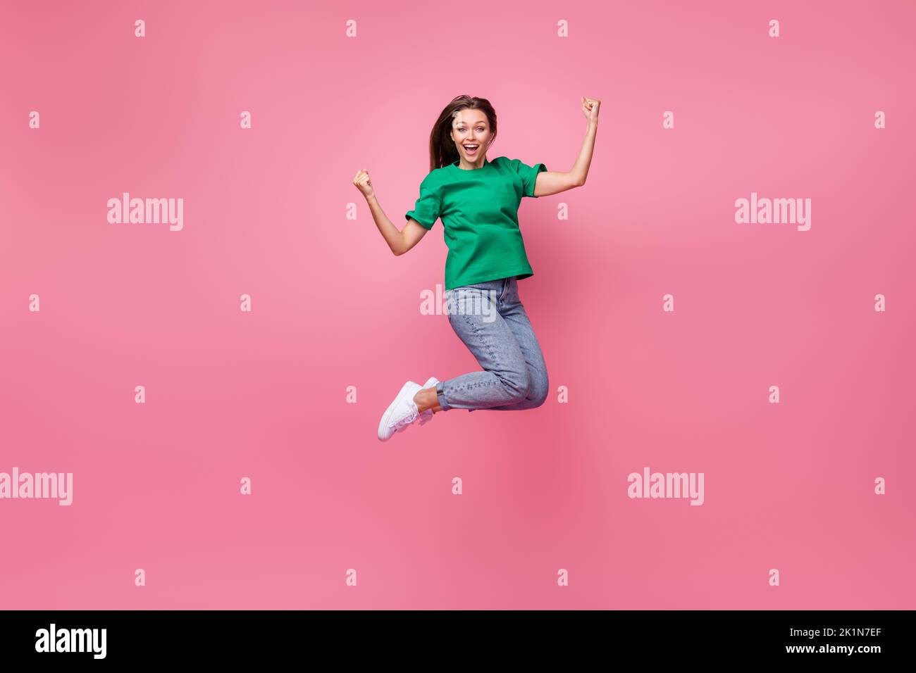 Full length photo of overjoyed energetic person jumping raise fists ...