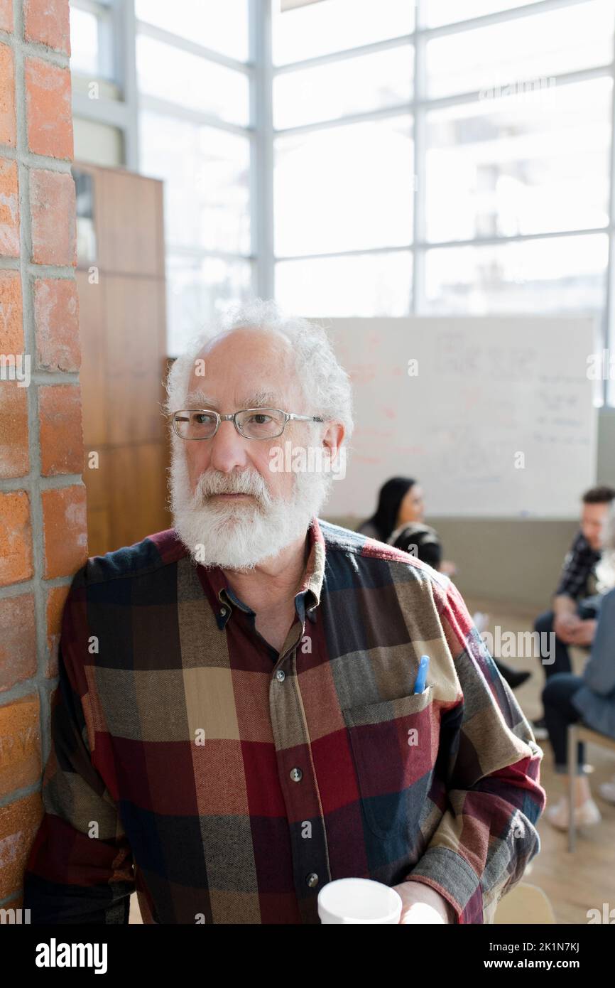 Senior man standing hi-res stock photography and images - Alamy