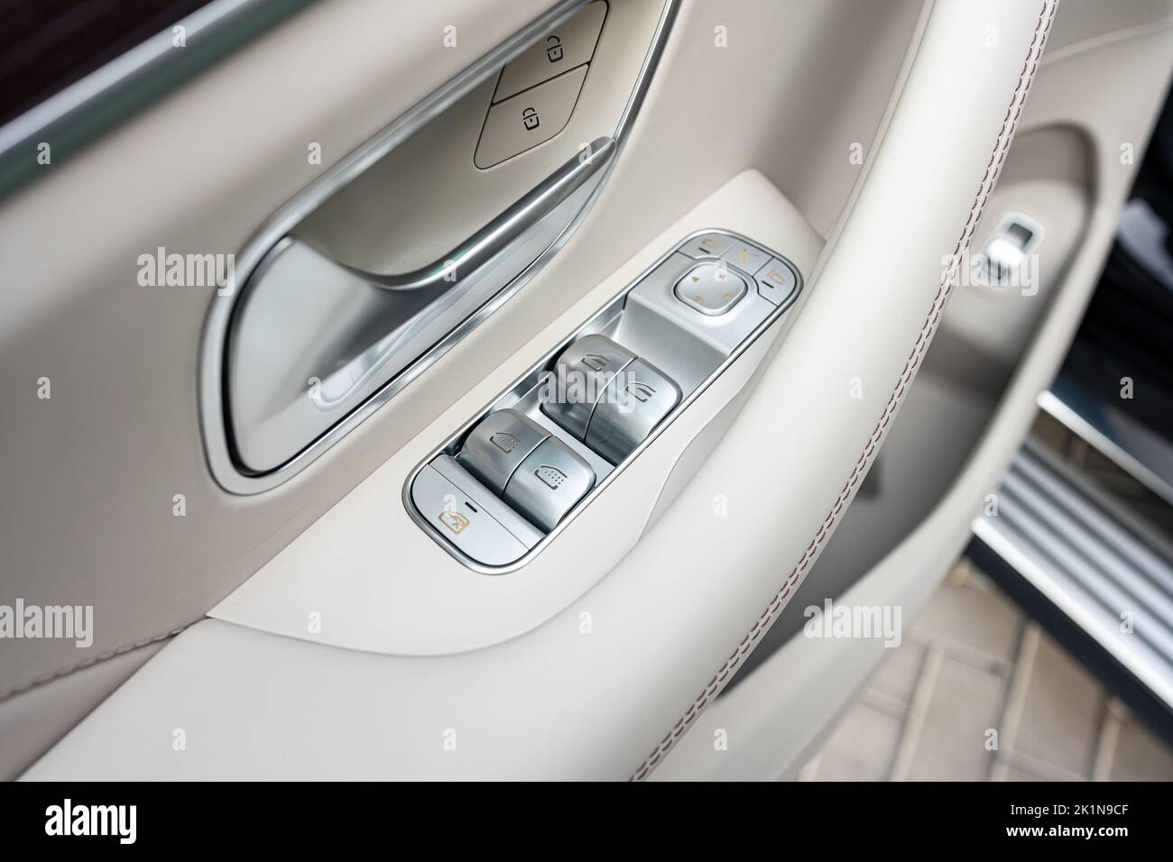 Front handle door panel with buttons of a luxury car Stock Photo - Alamy