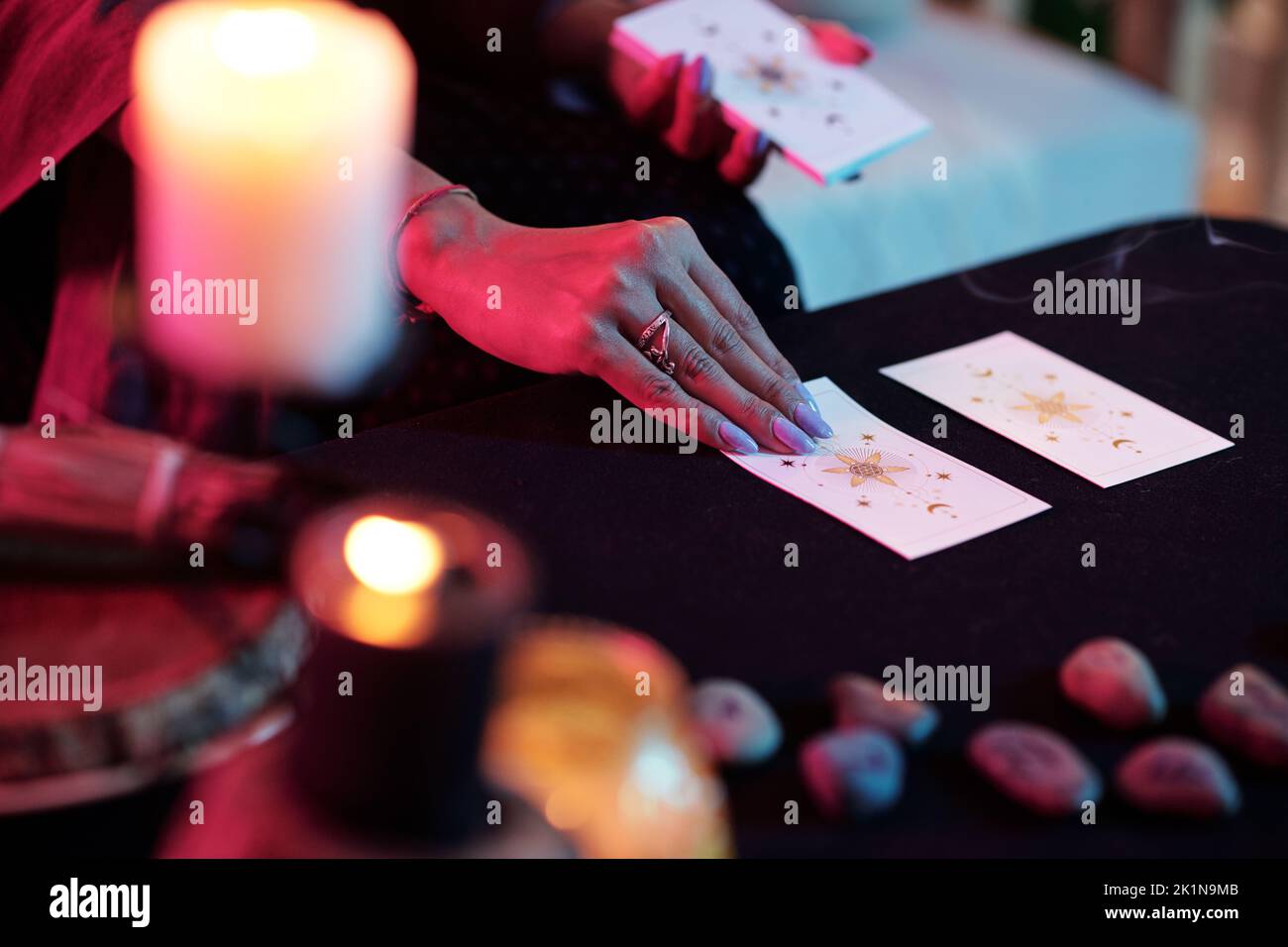 Closeup image of fortune teller predicting future with tarot cards ...