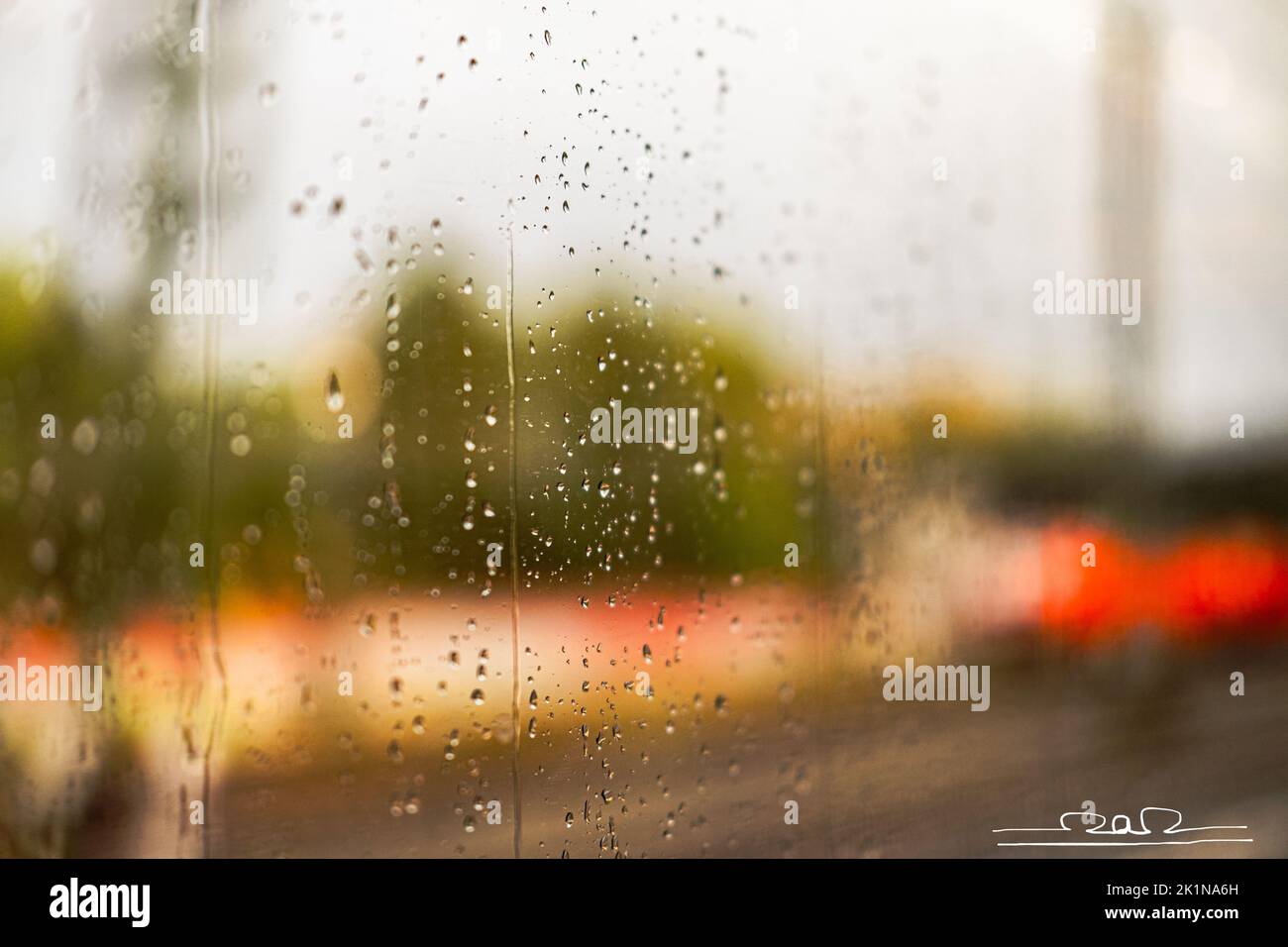 raindrops on the window in the train during the rainy season Stock ...