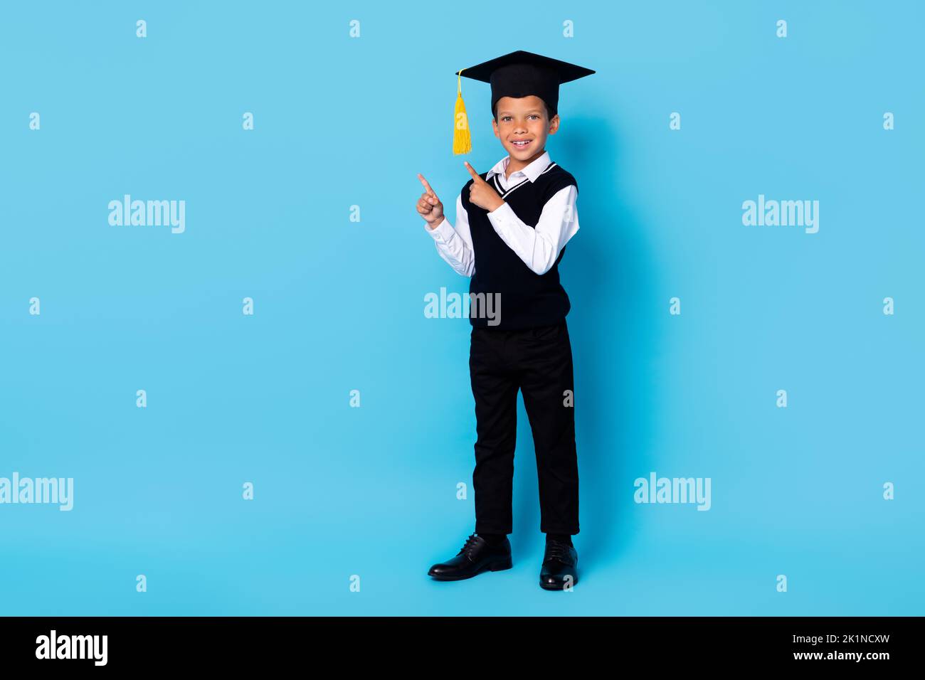 Full length photo of charming funny small boy wear black waistcoat ...