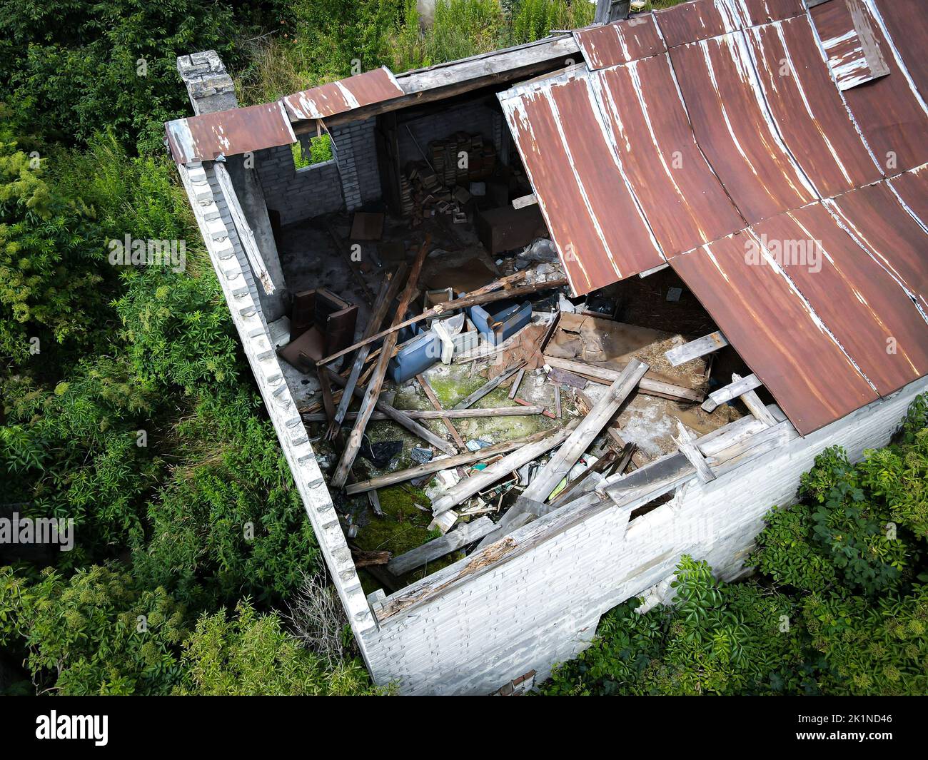 Aerial drone shot of the abandoned buildings visible roof damage Stock ...