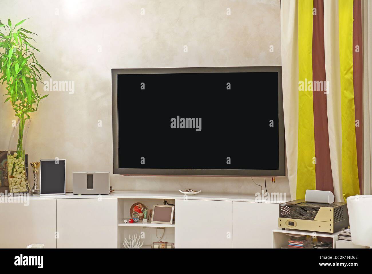 Large TV screen inside modern living room interior Stock Photo - Alamy