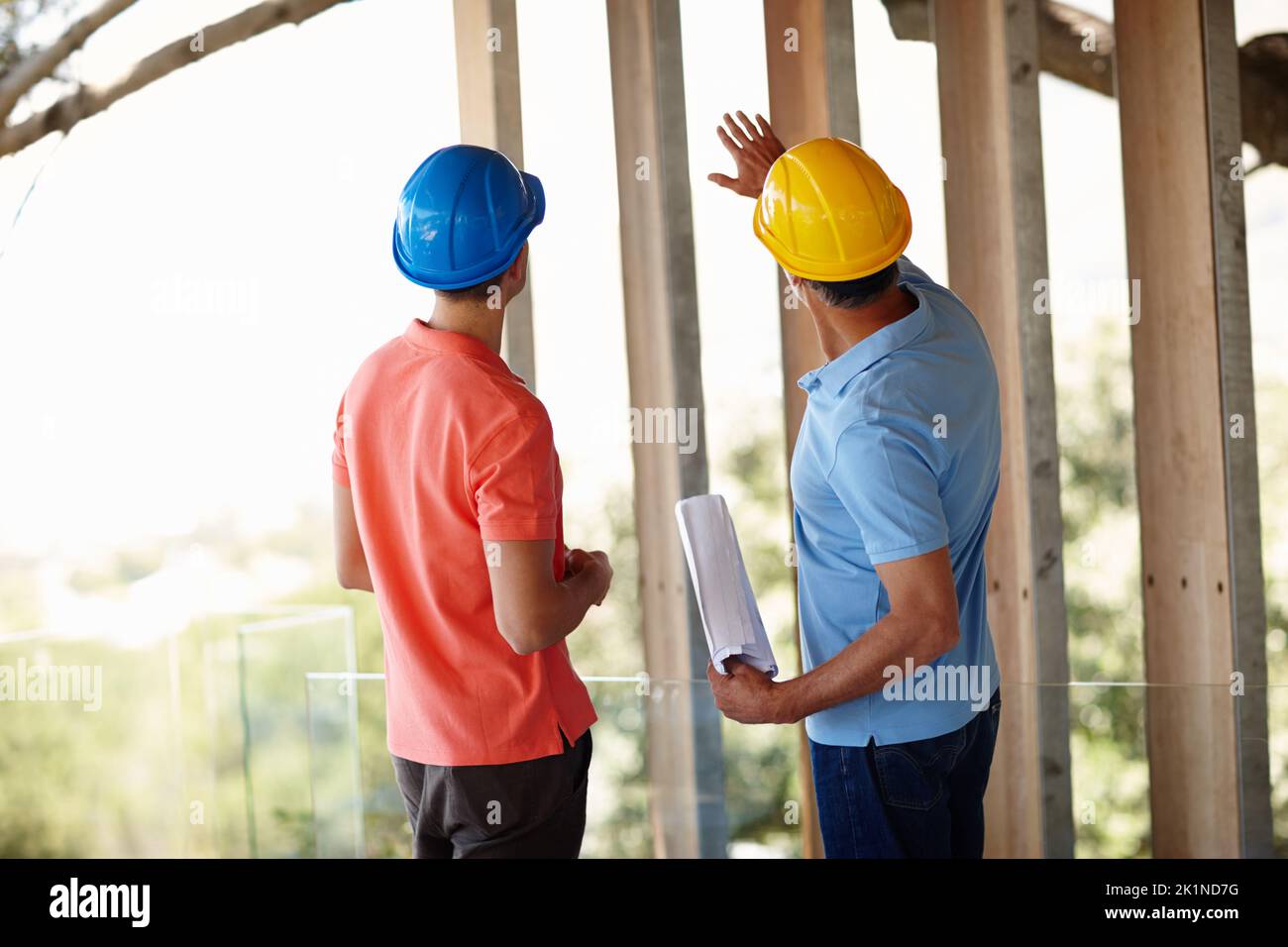 I could see a big window over here. Two architects assessing the ...