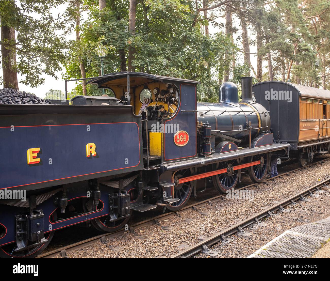 41. Vintage steam train and wooden passenger carriages in Holt station ...