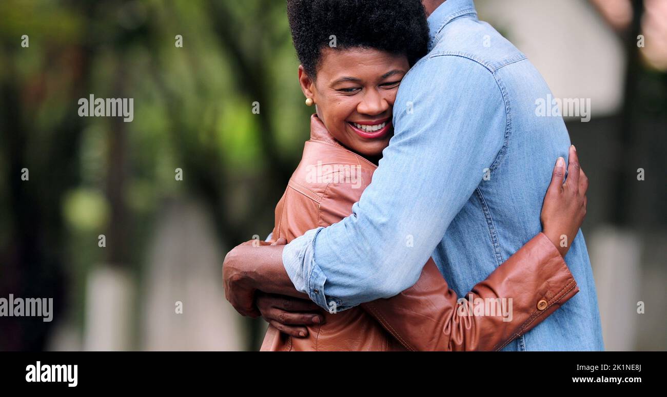 African people embrace. Two people hugging Stock Photo - Alamy