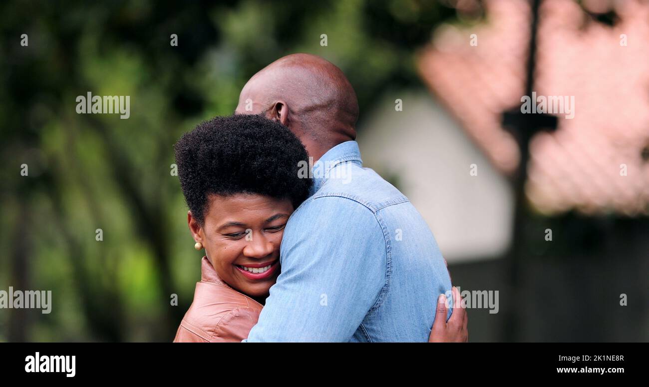African people embrace. Two people hugging Stock Photo - Alamy