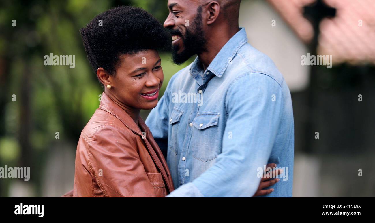 African people embrace. Two people hugging Stock Photo - Alamy