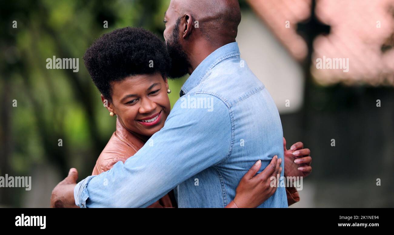 African people embrace. Two people hugging Stock Photo - Alamy