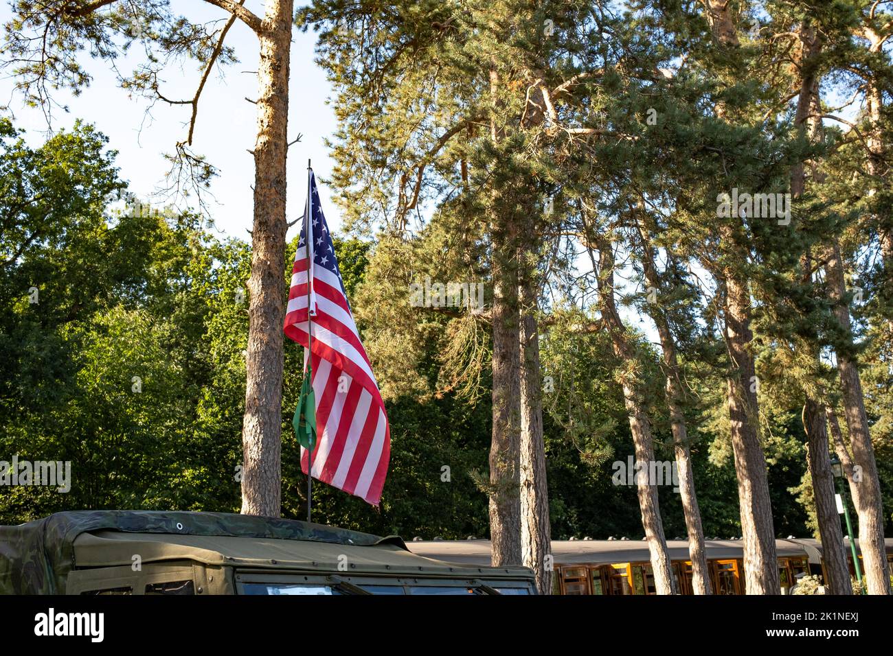 81. US Stars and Stripes flag on top of an ex-US army military jeep on ...
