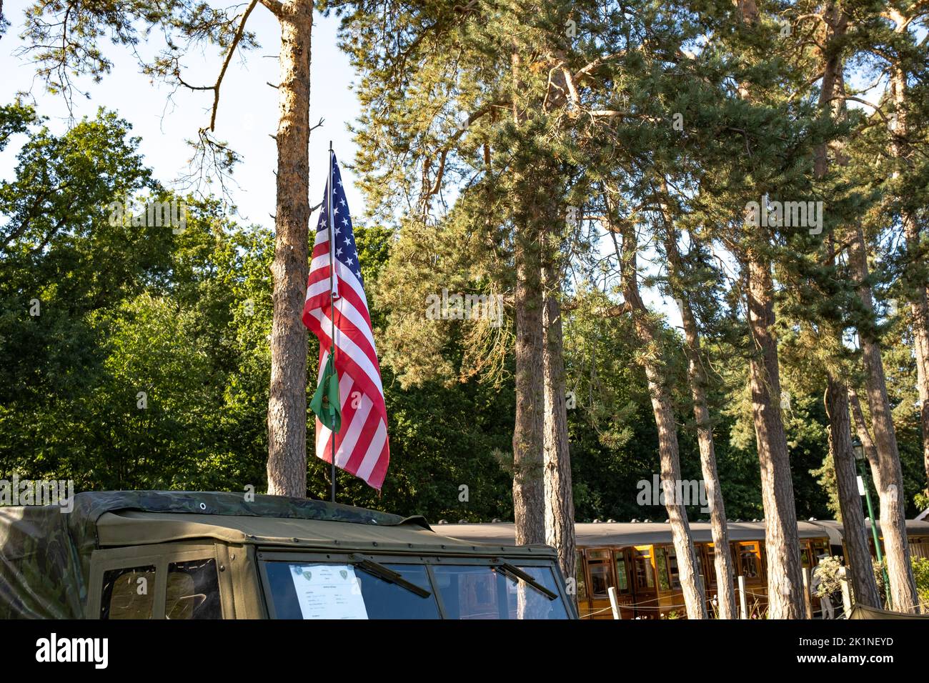 82. US Stars and Stripes flag on top of an ex-US army military jeep on display at a World War 2 ...