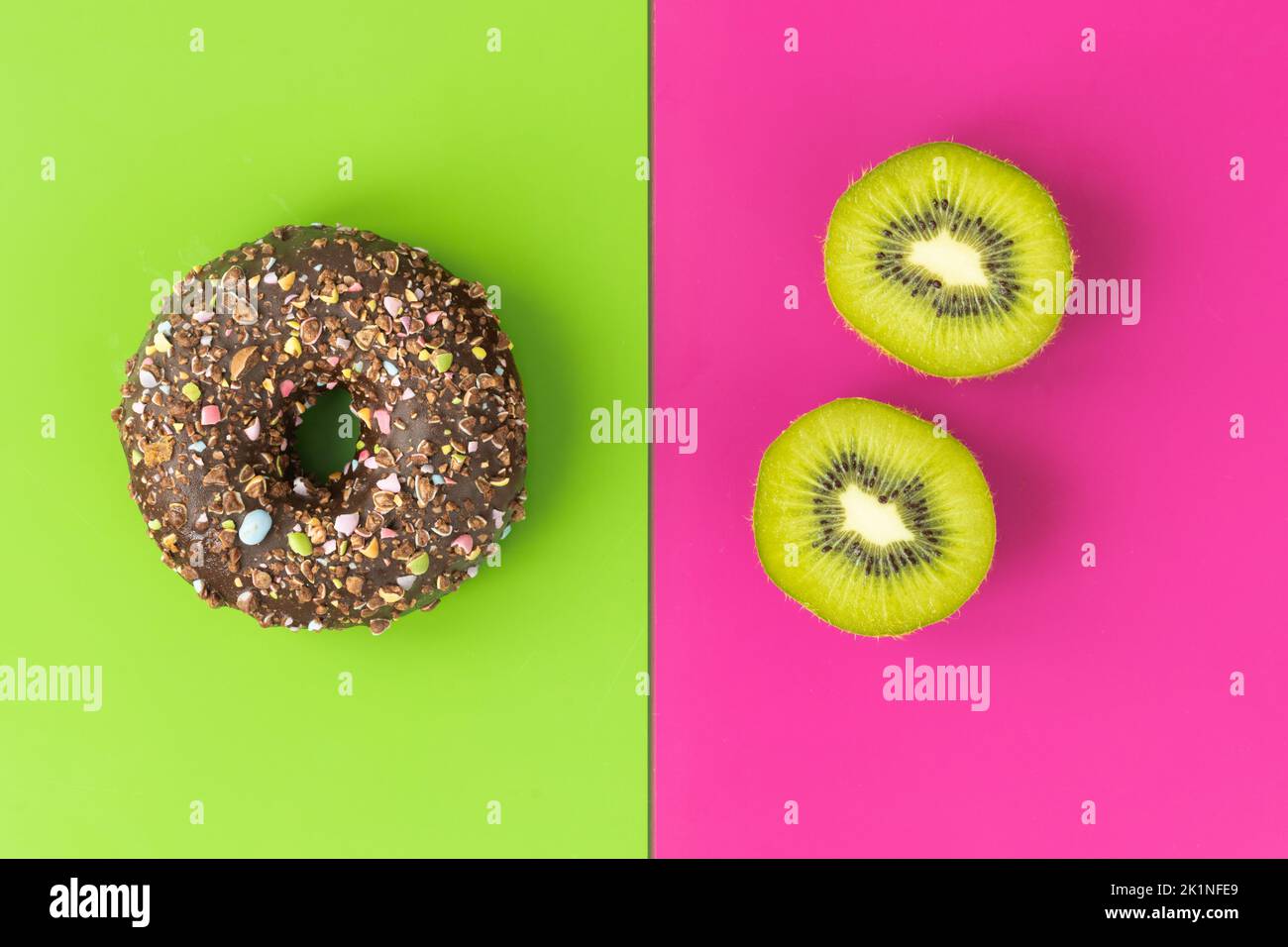 Healthy and unhealthy food, flat layer, two-color chocolate donuts with ...