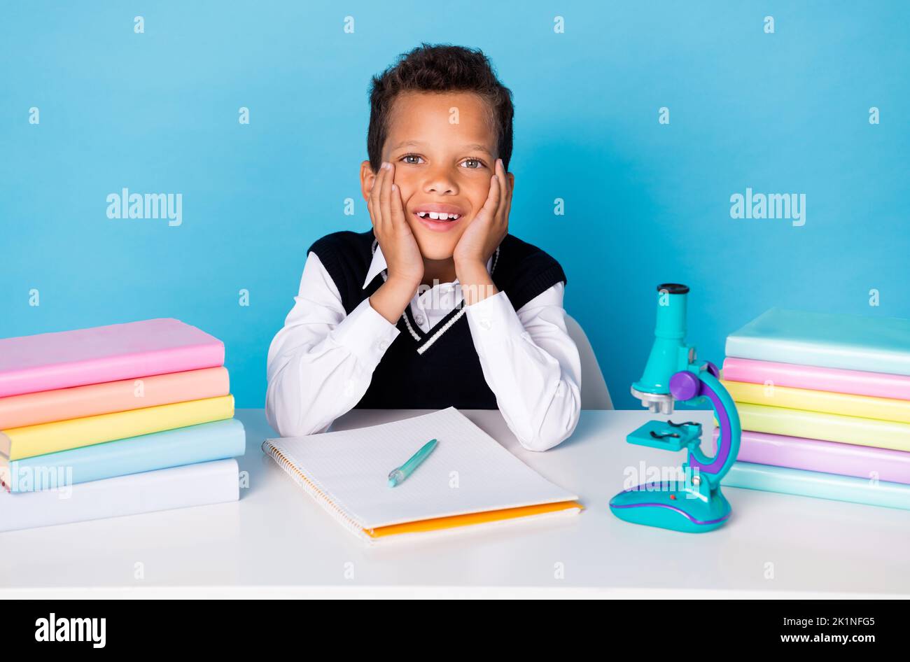 Photo of clever positive person arms touch cheeks toothy smile prepare ...