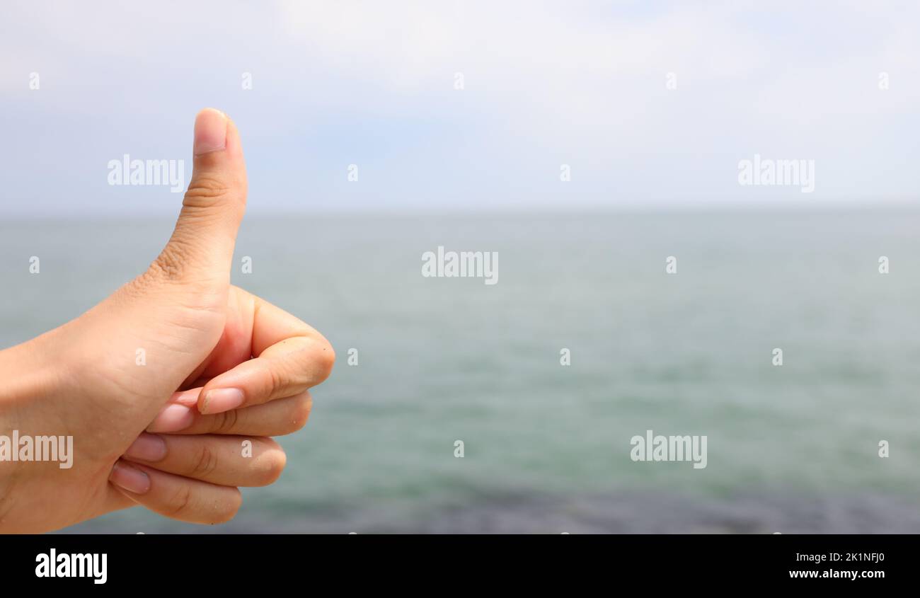 thumbs up as a sign of perfection and everything is fine without ...