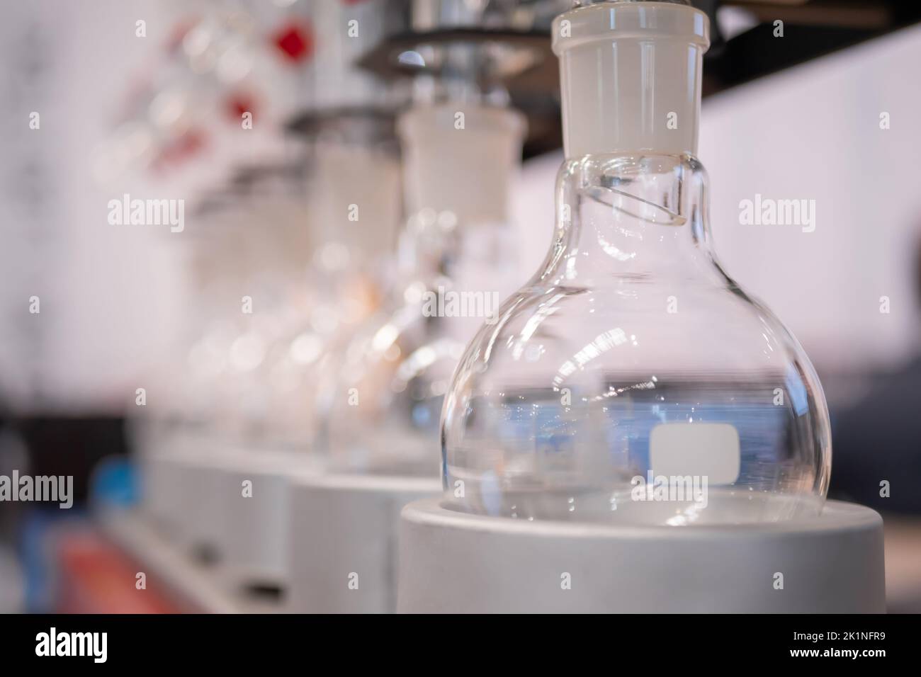 Laboratory equipment - empty glass flask on heating mantle in row Stock ...