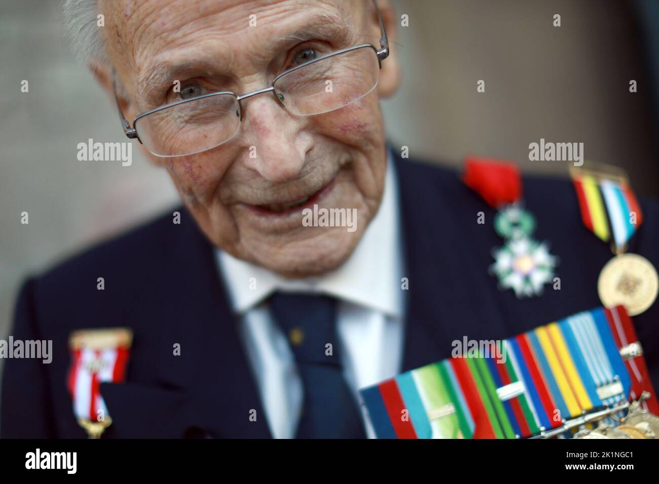Retired Commander Peter Chance, a 101-year-old veteran, poses for a ...
