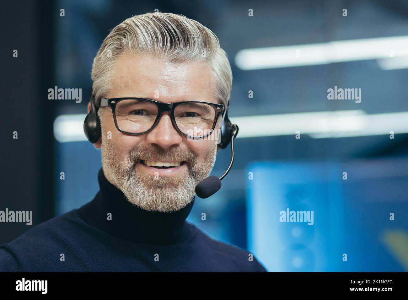 Closeup portrait of senior mature boss with headset, video call, man ...