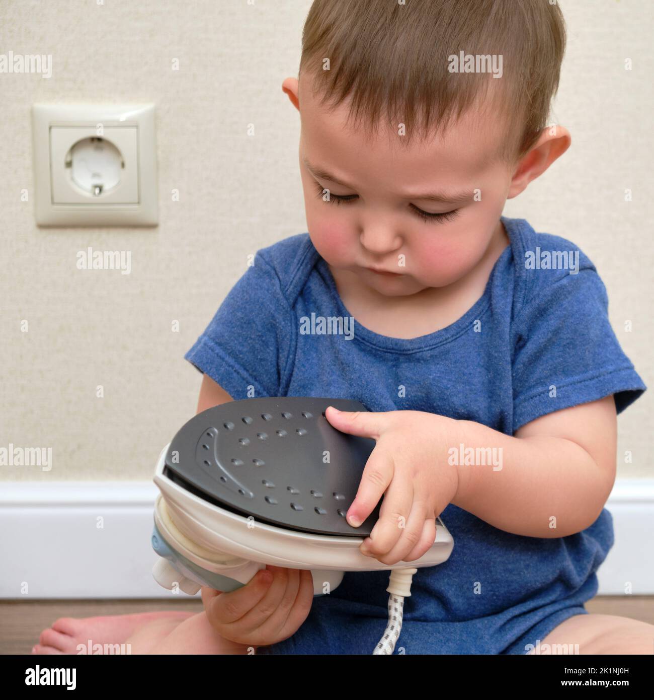 Baby boy playing cable wire hi-res stock photography and images - Alamy
