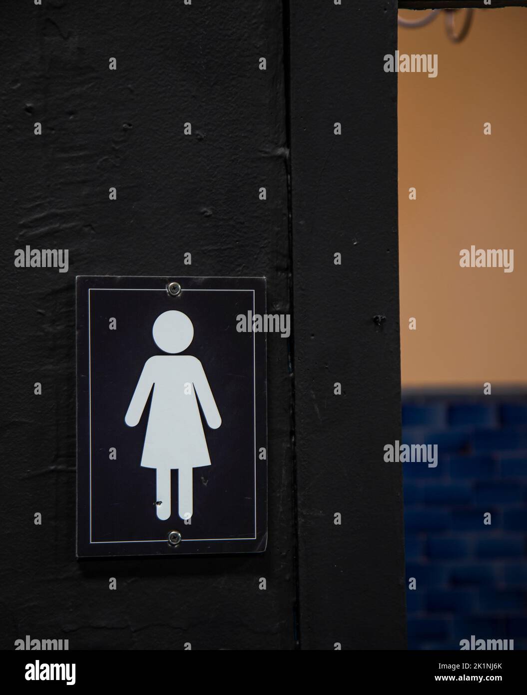 Women's bathroom sign Stock Photo - Alamy