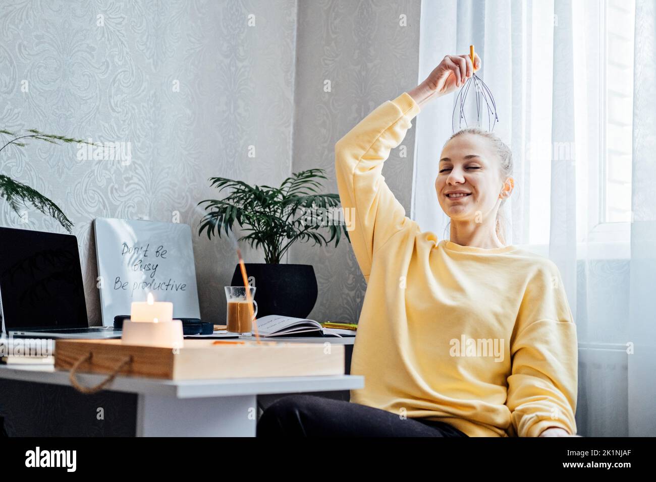 Woman on workplace with Head Massager Scalp Scratcher with Fingers ...