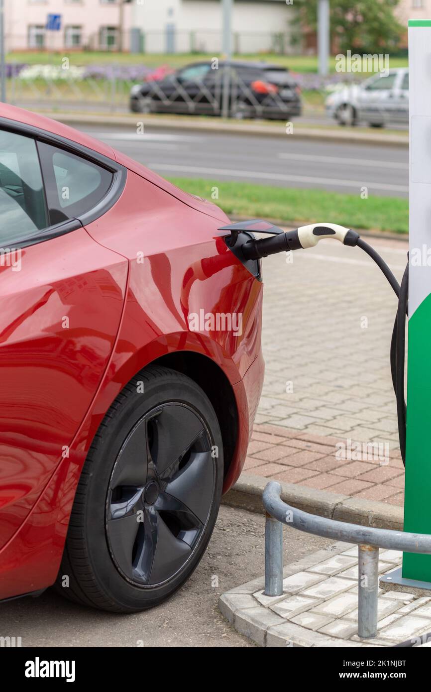 Power supply connect to electric vehicle for charge to the battery ...