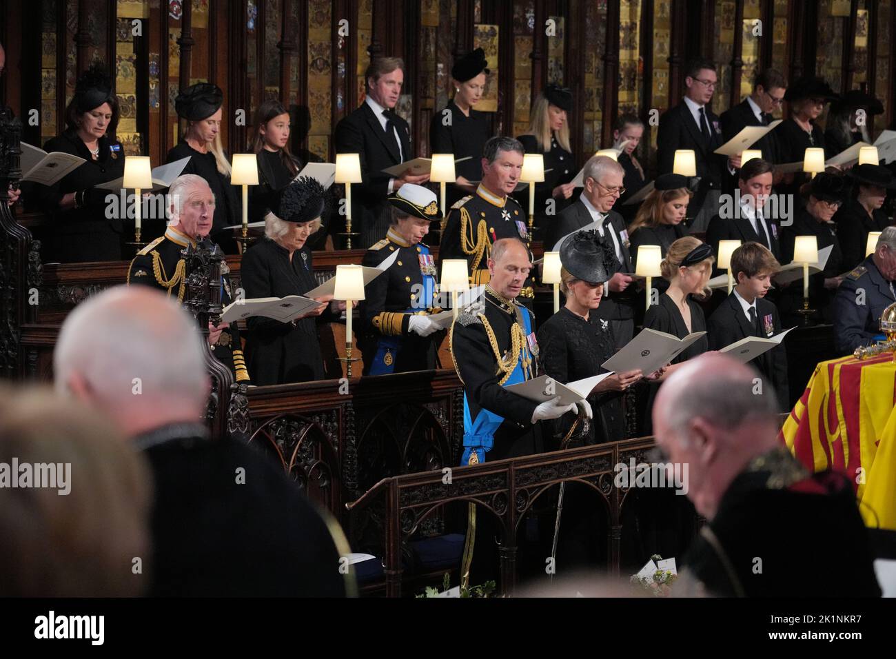 Members of the royal family, including King Charles III (left), during ...