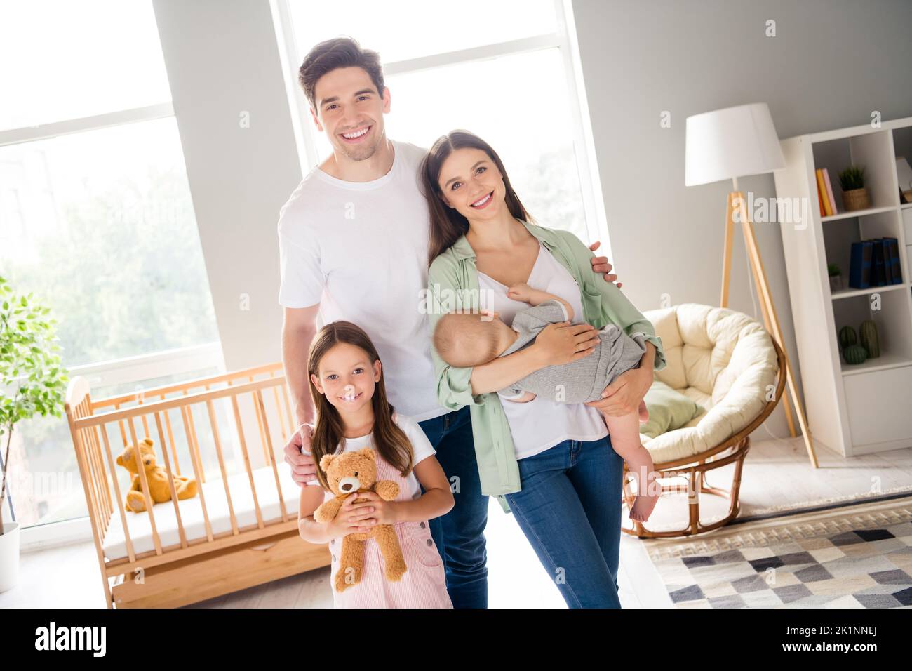 Photo Of Lovely Idyllic People Arms Hold Newborn Cuddle Toothy Smile