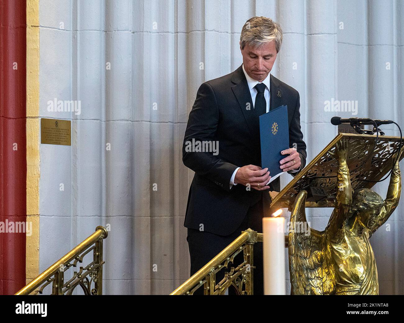 Nova Scotia Premier Tim Houston heads from the pulpit after delivering ...