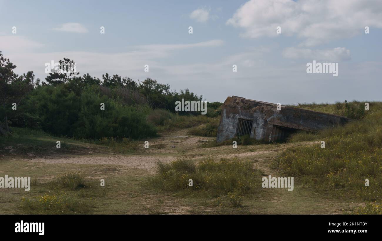 Ruin of a bunker on the beach hi-res stock photography and images - Alamy