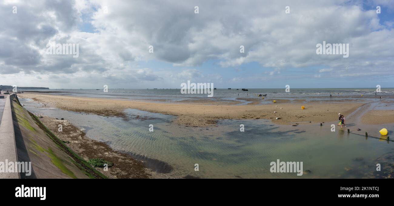 Panorama of the rhe ruins of artificial port of Gold beach on sunny ...