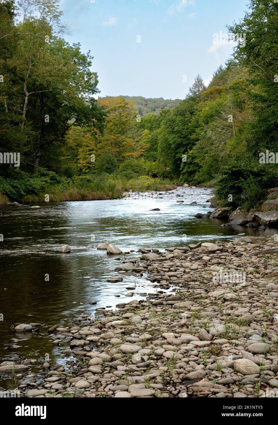 Roscoe, NY - USA - Sept 17, 2022 Vertical scenic view of the flowing ...