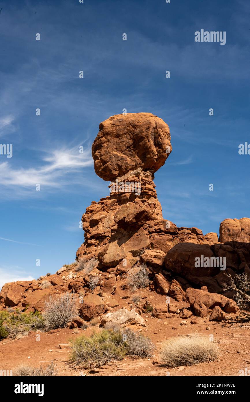 Balanced Rock and Wispy Clouds on sunny day in Arches National Park ...