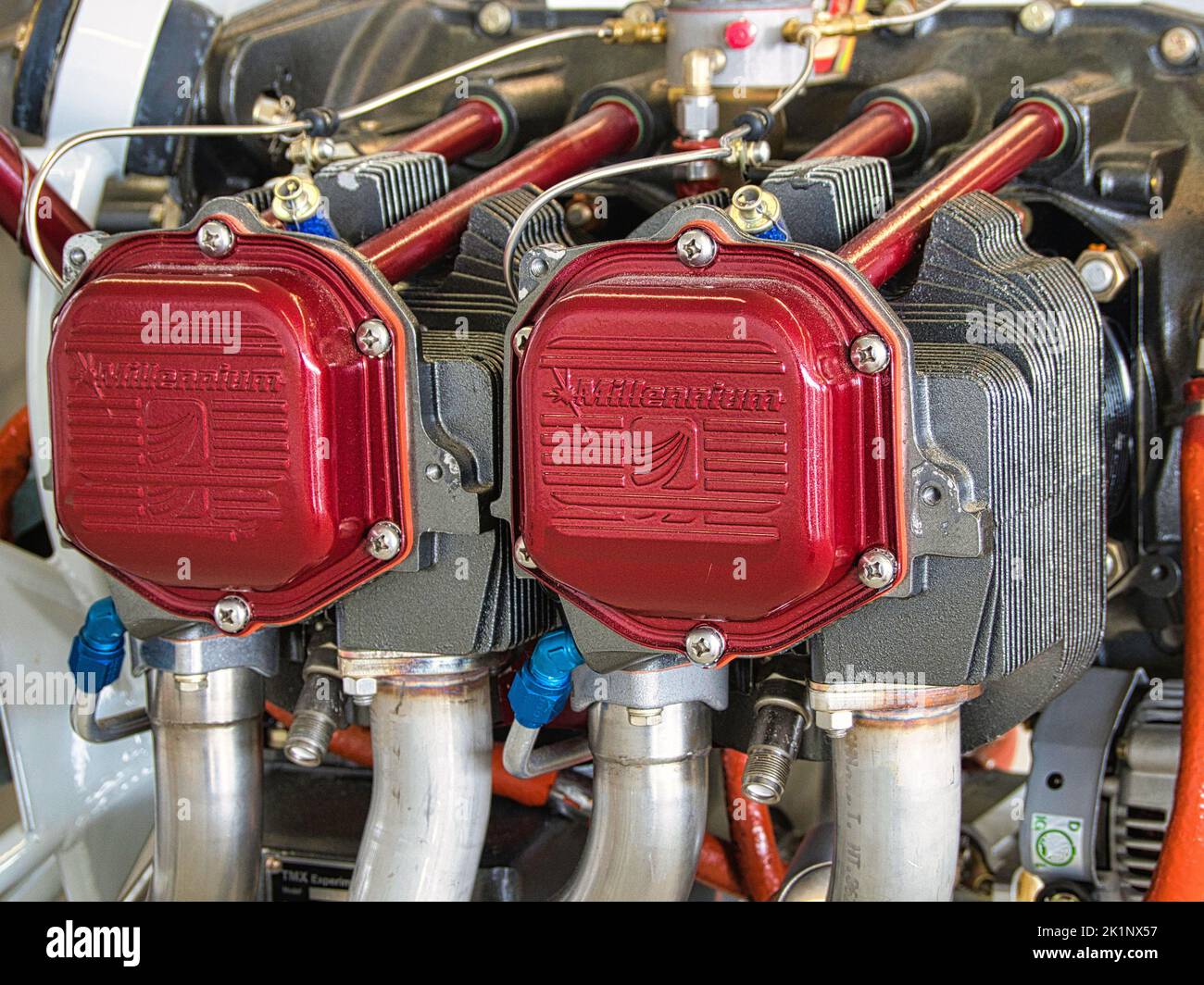Millennium cylinder on a vintage airplane engine Stock Photo - Alamy