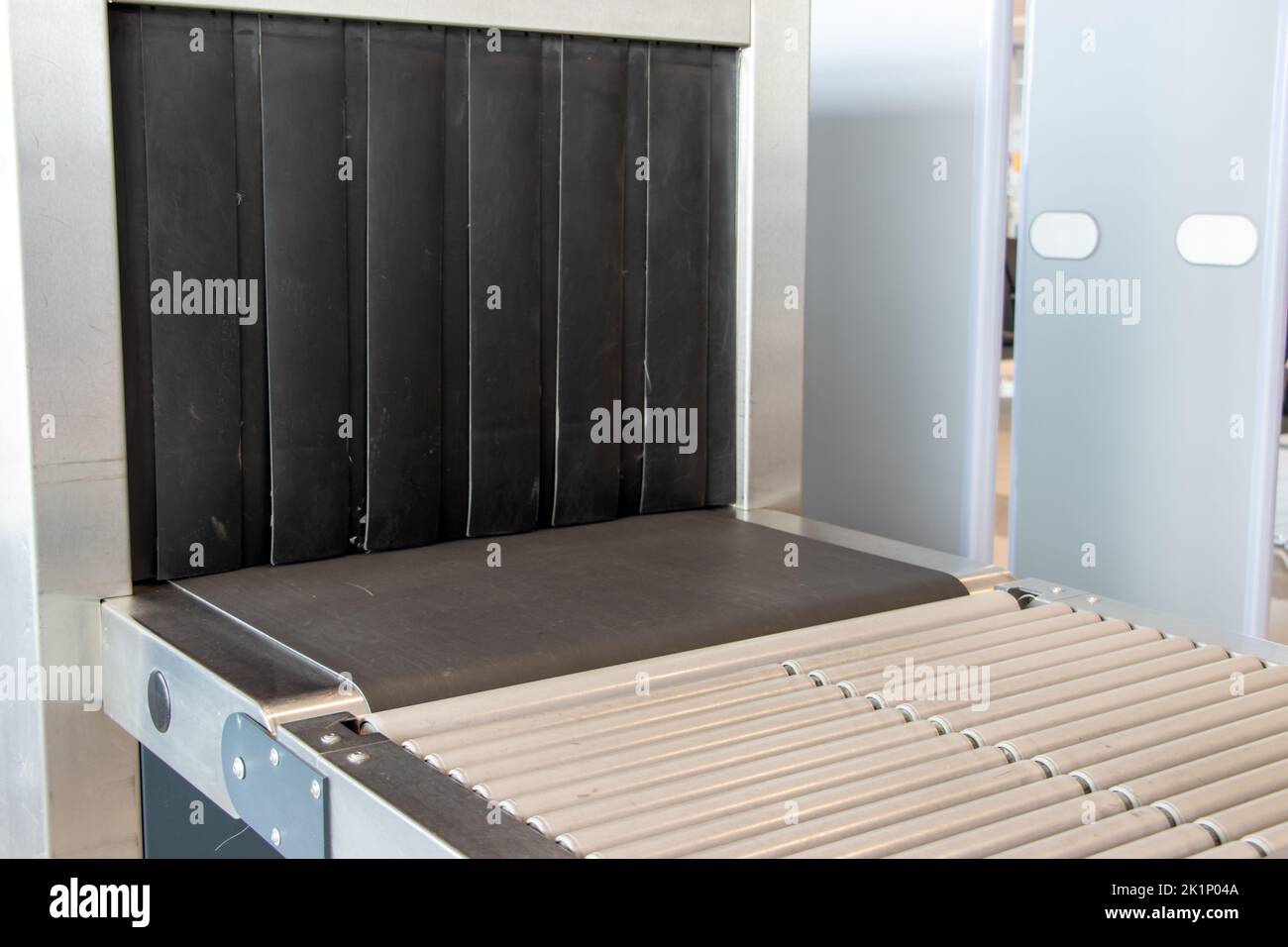 The luggage scanner at airport terminal. A baggage checkpoint at ...