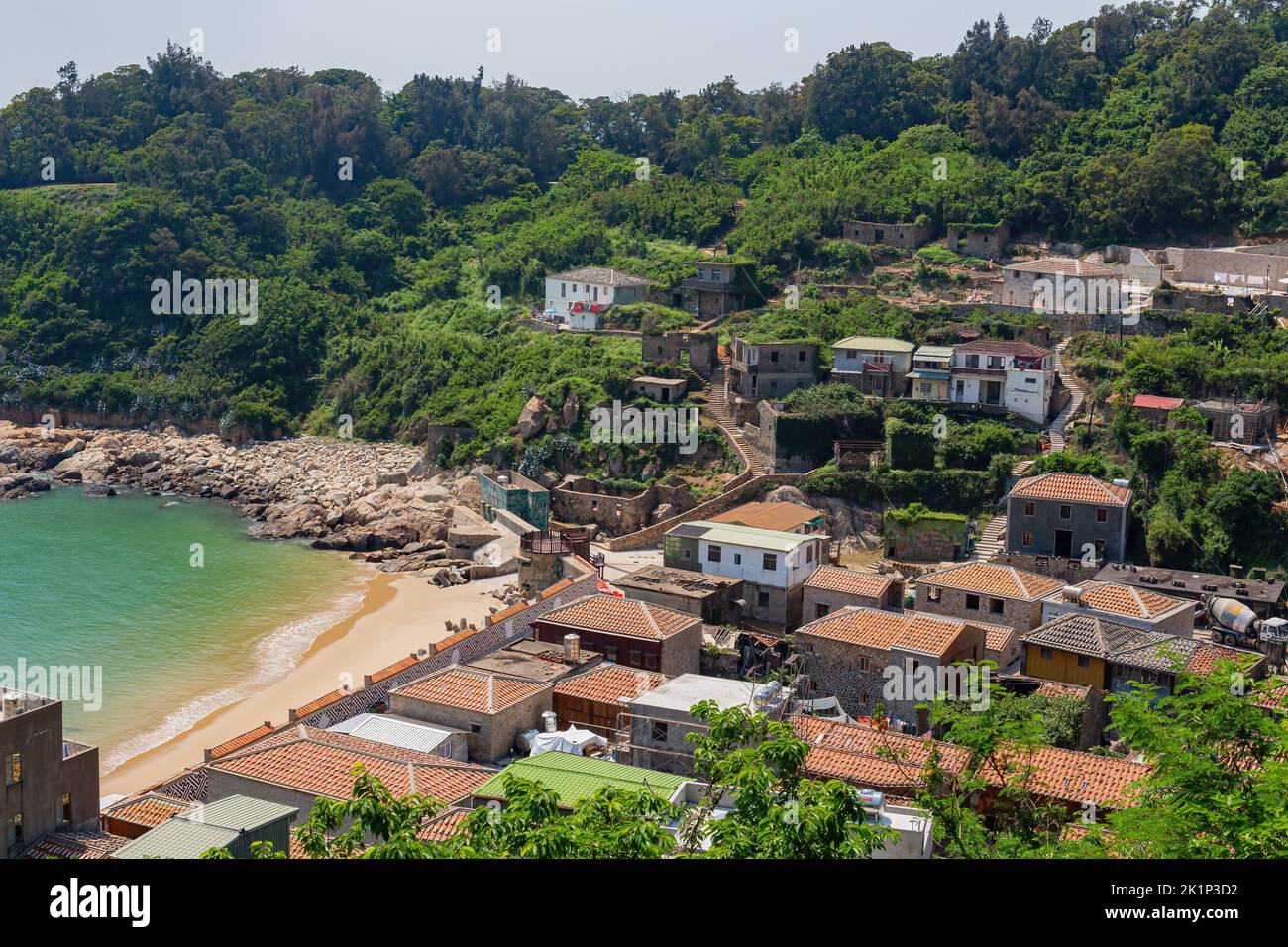 Sunny view of the Jinsha Village cityscape with beach view at Matsu ...