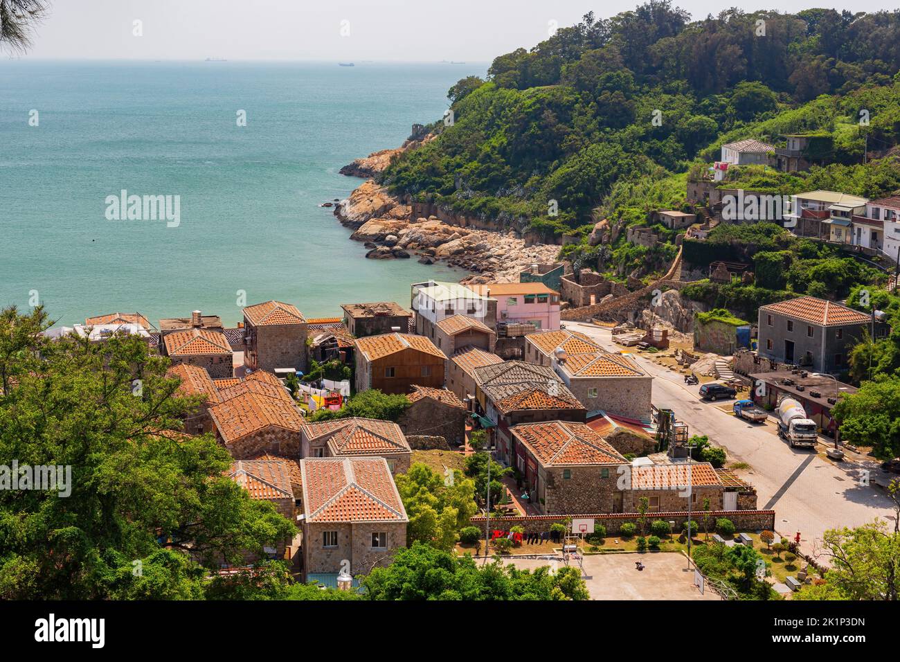 Sunny view of the Jinsha Village cityscape with beach view at Matsu ...